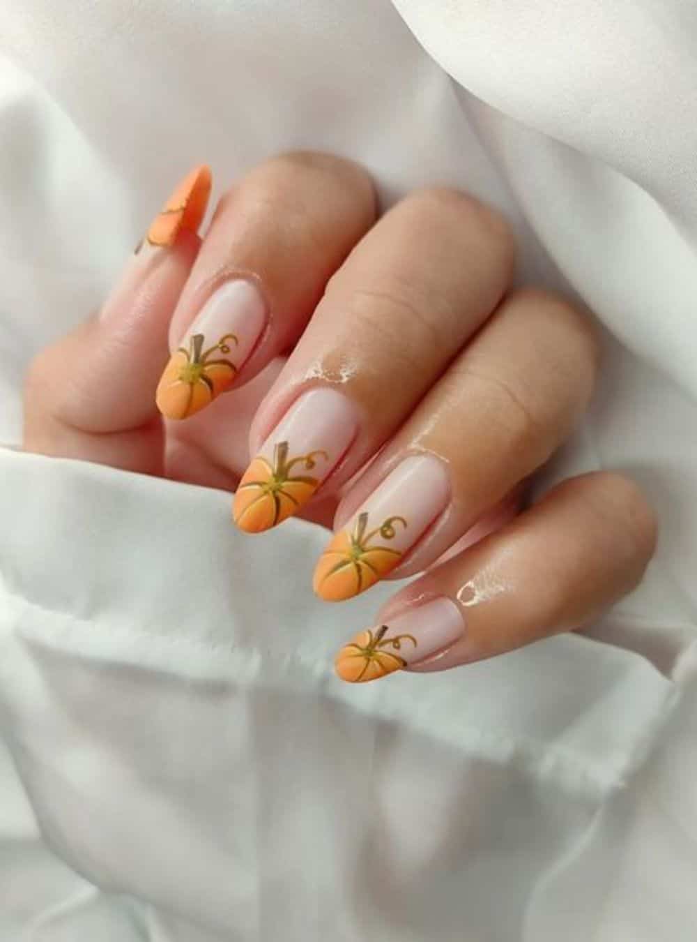 20+ Pumpkin Nails That Bring Chic Colors To Your Fingertips