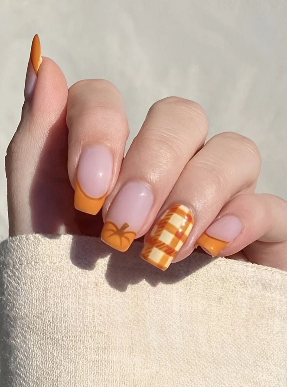 20+ Pumpkin Nails That Bring Chic Colors To Your Fingertips